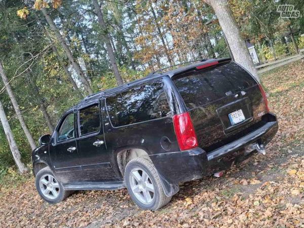 Melns GMC Yukon 2011 Telšiai, ar dzinēja tilpumu 5.30 L un nobraukumu 316 tūkst. km par 12000 €, foto 3 vietnē AUTOMOTO.COM.LV