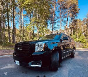 Black GMC Yukon 2016 in Pasvalys, with an engine capacity of 6.16 L and mileage of 290 thousand km for 22500 €, photo  on AUTOMOTO.COM.LV