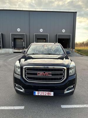 Black GMC Yukon 2017 in Vilnius, with an engine capacity of 5.30 L and mileage of 265 thousand km for 19900 €, photo 4 on AUTOMOTO.COM.LV