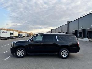 Black GMC Yukon 2017 in Vilnius, with an engine capacity of 5.30 L and mileage of 265 thousand km for 19900 €, photo 6 on AUTOMOTO.COM.LV