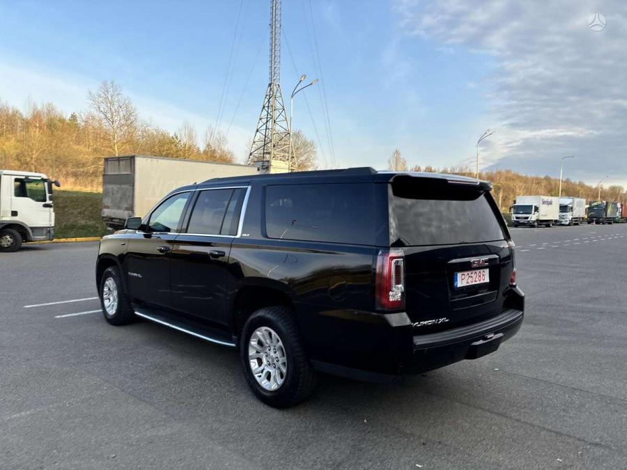 Black GMC Yukon 2017 in Vilnius, with an engine capacity of 5.30 L and mileage of 265 thousand km for 19900 €, photo 9 on AUTOMOTO.COM.LV