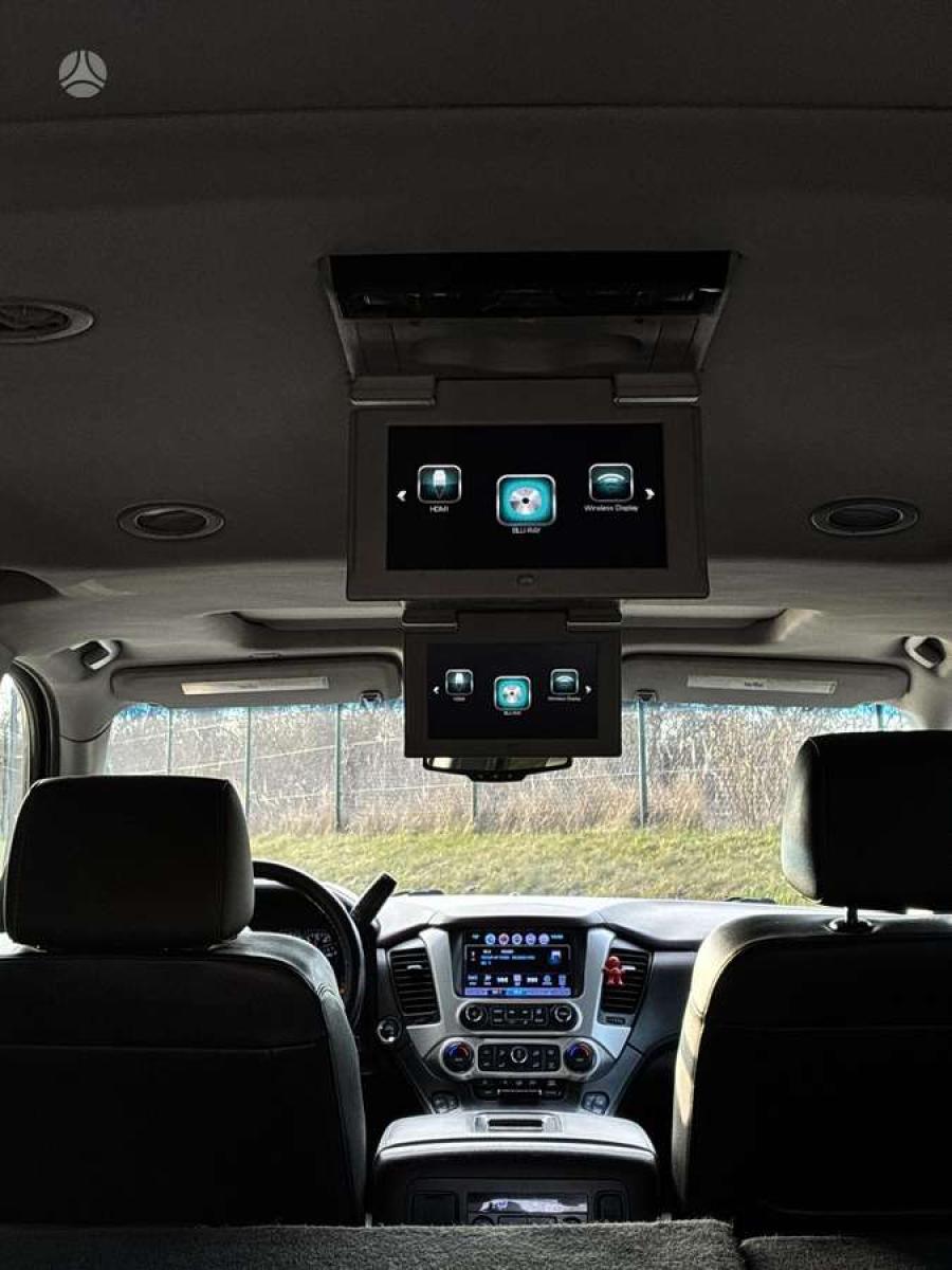 Black GMC Yukon 2017 in Vilnius, with an engine capacity of 5.30 L and mileage of 265 thousand km for 19900 €, photo 16 on AUTOMOTO.COM.LV