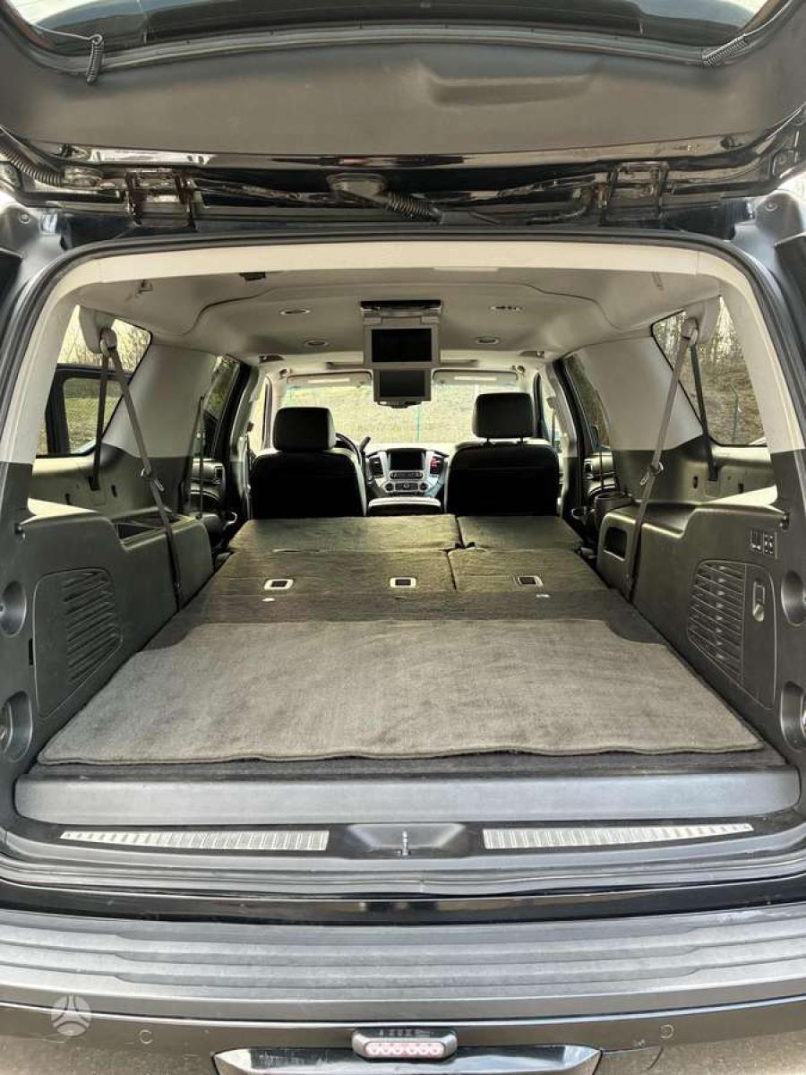 Black GMC Yukon 2017 in Vilnius, with an engine capacity of 5.30 L and mileage of 265 thousand km for 19900 €, photo 25 on AUTOMOTO.COM.LV