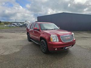 Red GMC Yukon 2013 in Vilnius, with an engine capacity of 6.20 L and mileage of 334 thousand km for 9900 €, photo 4 on AUTOMOTO.COM.LV