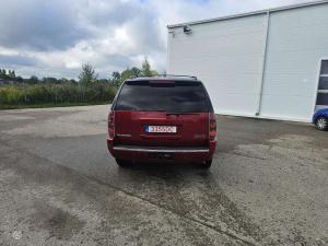Red GMC Yukon 2013 in Vilnius, with an engine capacity of 6.20 L and mileage of 334 thousand km for 9900 €, photo 6 on AUTOMOTO.COM.LV