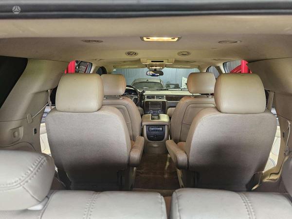 Red GMC Yukon 2013 in Vilnius, with an engine capacity of 6.20 L and mileage of 334 thousand km for 9900 €, photo 8 on AUTOMOTO.COM.LV