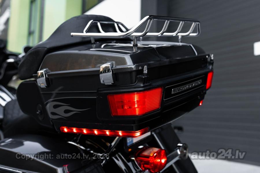 Black Harley-Davidson Electra Glide 2011 in Tallinn, with an engine capacity of 1.69 L and mileage of 18 thousand km for 11990 €, photo 23 on AUTOMOTO.COM.LV