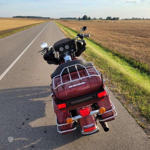 Red Harley-Davidson Electra Glide 2010 in Joniskis, with an engine capacity of 1.58 L and mileage of 95 thousand km for 8200 €, photo 6 on AUTOMOTO.COM.LV