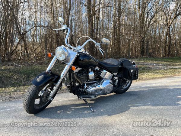 Melns Harley-Davidson Fat Boy 2000 Pērnava, ar dzinēja tilpumu 1.45 L un nobraukumu 30 tūkst. km par 9990 €, foto 1 vietnē AUTOMOTO.COM.LV