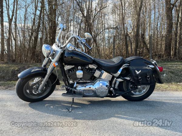 Melns Harley-Davidson Fat Boy 2000 Pērnava, ar dzinēja tilpumu 1.45 L un nobraukumu 30 tūkst. km par 9990 €, foto 2 vietnē AUTOMOTO.COM.LV