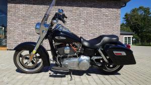 Black Harley-Davidson FLD 2012 in Kaunas, with an engine capacity of 1.69 L and mileage of 8 thousand km for 8500 €, photo  on AUTOMOTO.COM.LV