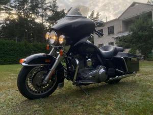 Black Harley-Davidson FLHT 2009 in Vilnius, with an engine capacity of 1.58 L and mileage of 77 thousand km for 6400 €, photo  on AUTOMOTO.COM.LV