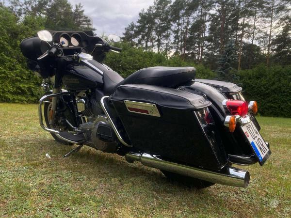 Black Harley-Davidson FLHT 2009 in Vilnius, with an engine capacity of 1.58 L and mileage of 77 thousand km for 6400 €, photo 5 on AUTOMOTO.COM.LV