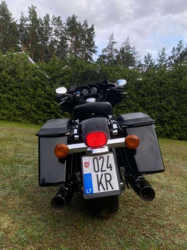 Black Harley-Davidson FLHT 2009 in Vilnius, with an engine capacity of 1.58 L and mileage of 77 thousand km for 6400 €, photo 7 on AUTOMOTO.COM.LV