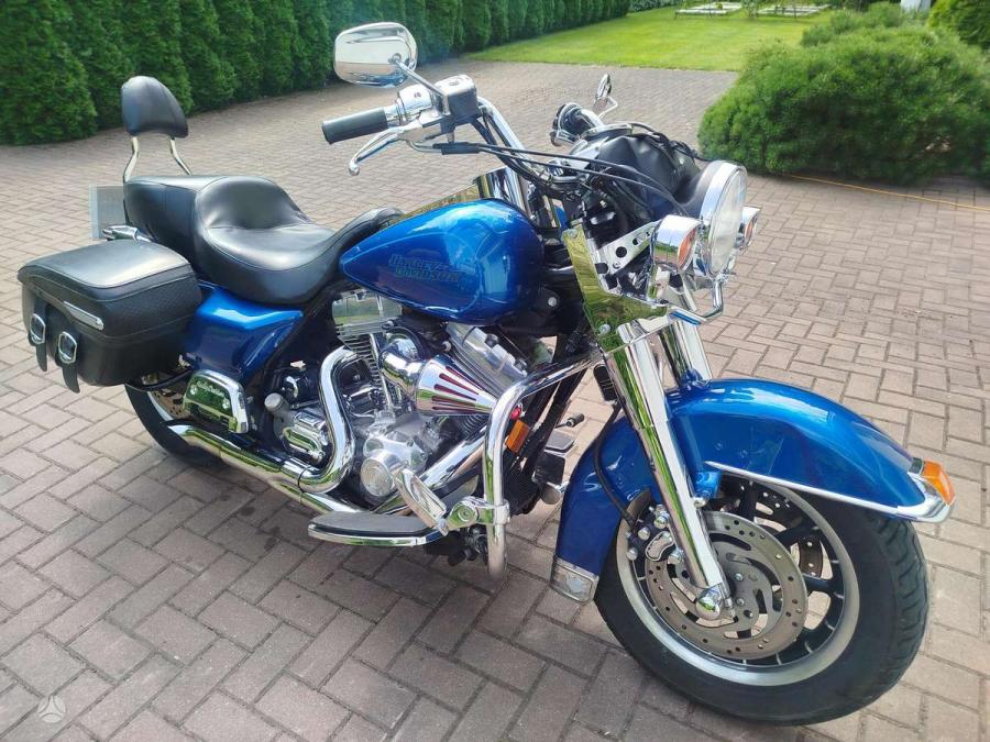 Blue Harley-Davidson FLHT 2006 in Vilnius, with an engine capacity of 1.45 L and mileage of 23 thousand km for 4400 €, photo 3 on AUTOMOTO.COM.LV