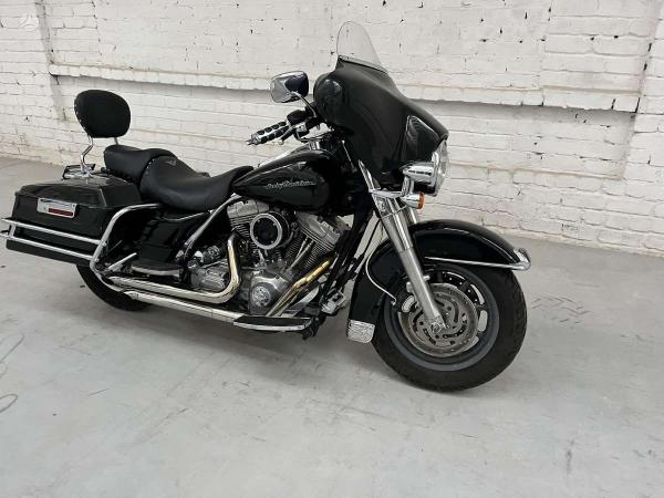 Harley-Davidson FLHT 2002 in Siauliai, with an engine capacity of 1.45 L and mileage of 35 thousand km for 5156 €, photo 4 on AUTOMOTO.COM.LV