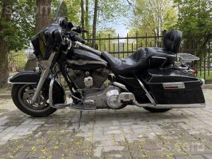 Harley-Davidson FLHT 2003 in Riga, with an engine capacity of 1.45 L and mileage of 0 thousand km for 7700 €, photo  on AUTOMOTO.COM.LV