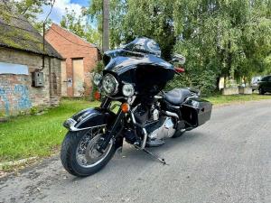 Black Harley-Davidson Flhtcui 2004 in Vilnius, with an engine capacity of 1.55 L and mileage of 55 thousand km for 5250 €, photo  on AUTOMOTO.COM.LV