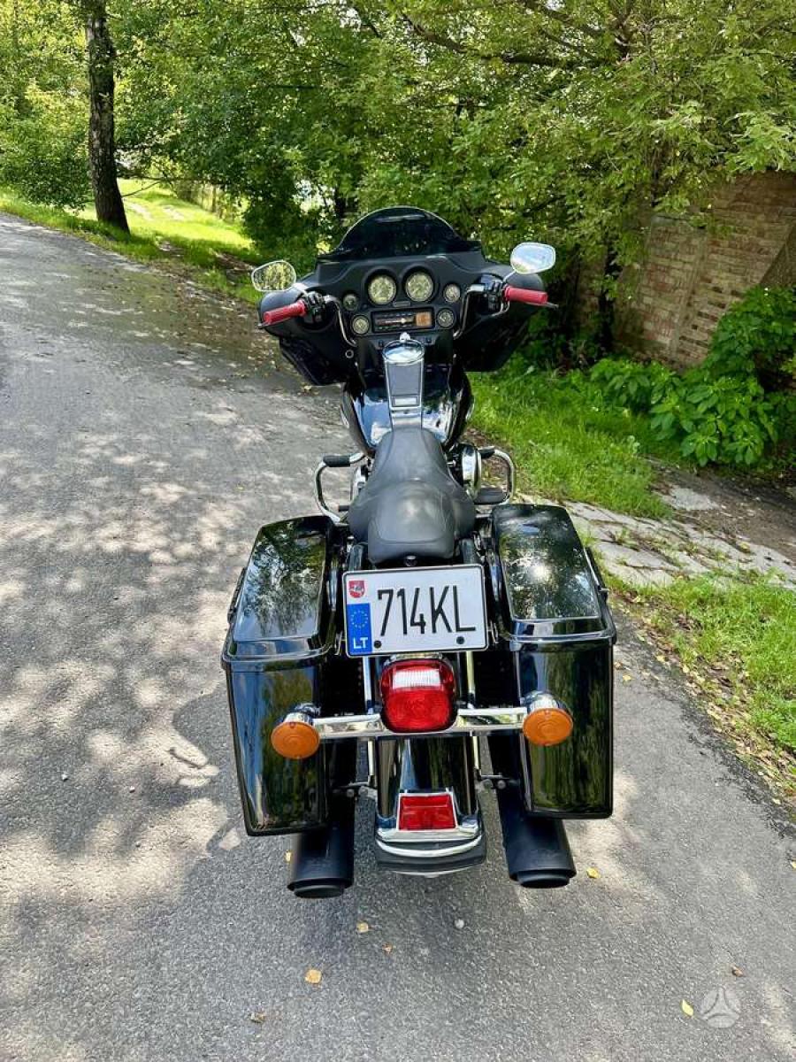 Black Harley-Davidson Flhtcui 2004 in Vilnius, with an engine capacity of 1.55 L and mileage of 55 thousand km for 5250 €, photo 5 on AUTOMOTO.COM.LV