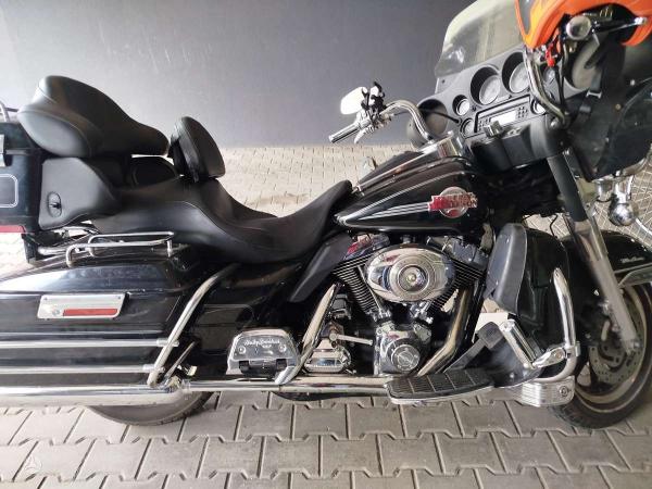 Black Harley-Davidson Flhtcui 2007 in Vilnius, with an engine capacity of 1.58 L and mileage of 80 thousand km for 7000 €, photo 1 on AUTOMOTO.COM.LV