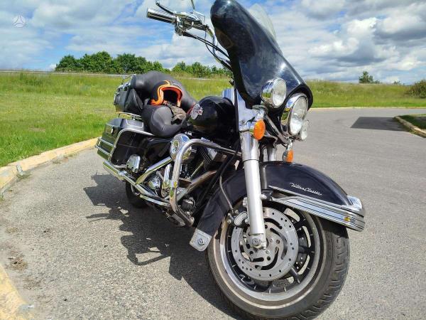 Black Harley-Davidson Flhtcui 2007 in Vilnius, with an engine capacity of 1.58 L and mileage of 80 thousand km for 7000 €, photo 4 on AUTOMOTO.COM.LV