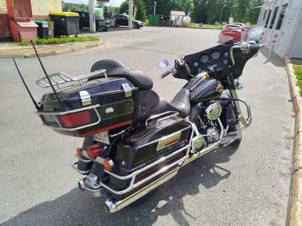 Black Harley-Davidson Flhtcui 2007 in Vilnius, with an engine capacity of 1.58 L and mileage of 80 thousand km for 7000 €, photo 6 on AUTOMOTO.COM.LV