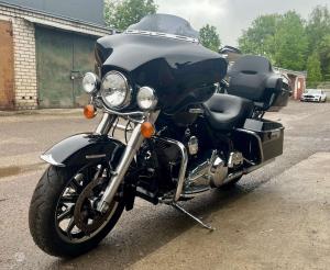 Black Harley-Davidson FLHTK 2010 in Kaunas, with an engine capacity of 1.69 L and mileage of 38 thousand km for 7800 €, photo 1 on AUTOMOTO.COM.LV