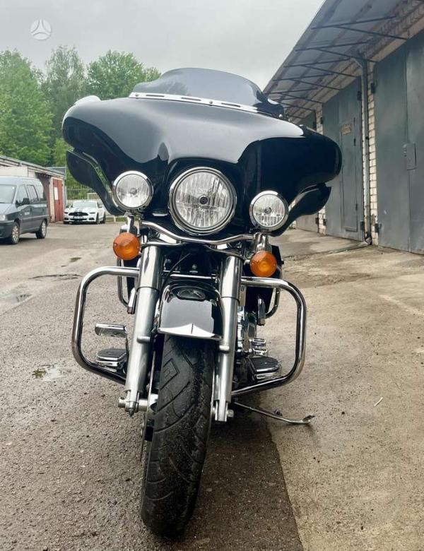 Black Harley-Davidson FLHTK 2010 in Kaunas, with an engine capacity of 1.69 L and mileage of 38 thousand km for 7800 €, photo 5 on AUTOMOTO.COM.LV