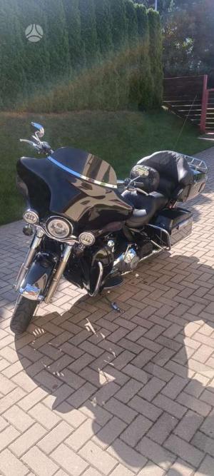 Black Harley-Davidson FLHTK 2012 in Vilnius, with an engine capacity of 1.69 L and mileage of 49 thousand km for 8400 €, photo 6 on AUTOMOTO.COM.LV