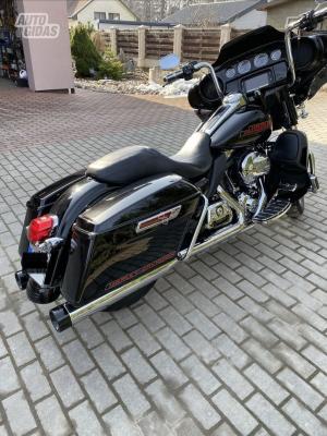 Melns Harley-Davidson FLHTK 2015 Klaipėda, ar dzinēja tilpumu 1.69 L un nobraukumu 67 tūkst. km par 12700 €, foto 12 vietnē AUTOMOTO.COM.LV