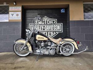 Harley-Davidson FLSTC 1988 Viļņa, ar dzinēja tilpumu 1.30 L un nobraukumu 10 tūkst. km par 6800 €, foto  vietnē AUTOMOTO.COM.LV