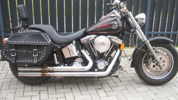 Black Harley-Davidson FXST 1993 in Vilnius, with an engine capacity of 1.34 L and mileage of 68 thousand km for 6600 €, photo 1 on AUTOMOTO.COM.LV