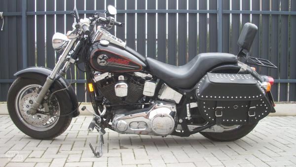 Black Harley-Davidson FXST 1993 in Vilnius, with an engine capacity of 1.34 L and mileage of 68 thousand km for 6600 €, photo 4 on AUTOMOTO.COM.LV