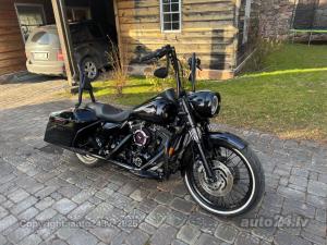 Melns Harley-Davidson Road King 2001 Valga, ar dzinēja tilpumu 1.58 L un nobraukumu 27 tūkst. km par 8350 €, foto  vietnē AUTOMOTO.COM.LV