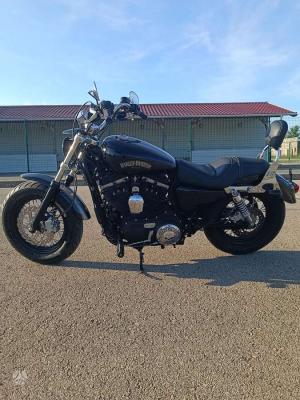 Black Harley-Davidson Sportster 2014 in Pagegiai, with an engine capacity of 1.20 L and mileage of 46 thousand km for 9100 €, photo  on AUTOMOTO.COM.LV