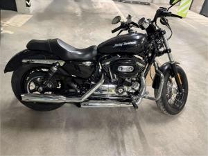 Melns Harley-Davidson Sportster 2018 Viļņa, ar dzinēja tilpumu 1.20 L un nobraukumu 15 tūkst. km par 6900 €, foto  vietnē AUTOMOTO.COM.LV