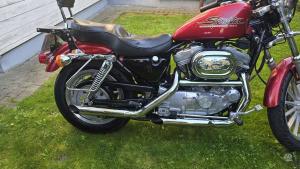 Red Harley-Davidson Sportster 1997 in Kaunas, with an engine capacity of 0.88 L and mileage of 64 thousand km for 3900 €, photo 6 on AUTOMOTO.COM.LV