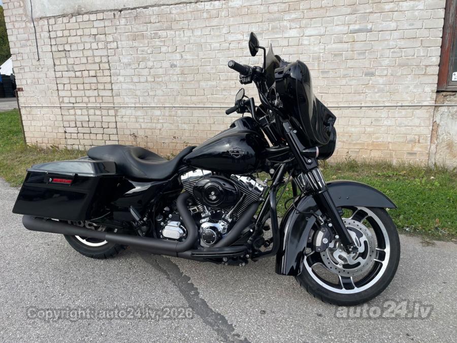 Black Harley-Davidson Street Glide 2013 in Tallinn, with an engine capacity of 1.70 L and mileage of 49 thousand km for 9900 €, photo 1 on AUTOMOTO.COM.LV