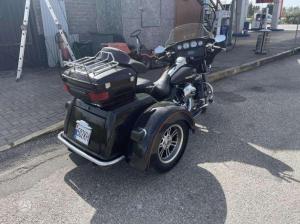 Red Harley-Davidson Tri Glide Ultra 2014 in Kaunas, with an engine capacity of 1.60 L and mileage of 48 thousand km for 13900 €, photo 4 on AUTOMOTO.COM.LV