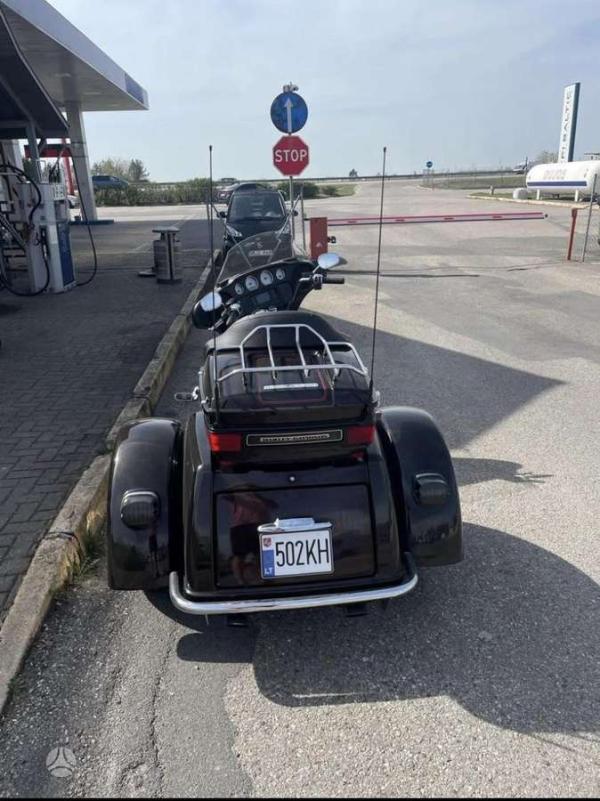 Red Harley-Davidson Tri Glide Ultra 2014 in Kaunas, with an engine capacity of 1.60 L and mileage of 48 thousand km for 13900 €, photo 5 on AUTOMOTO.COM.LV