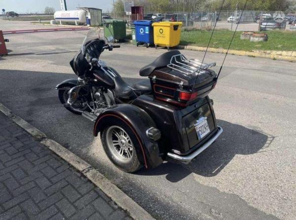 Red Harley-Davidson Tri Glide Ultra 2014 in Kaunas, with an engine capacity of 1.60 L and mileage of 48 thousand km for 13900 €, photo 7 on AUTOMOTO.COM.LV
