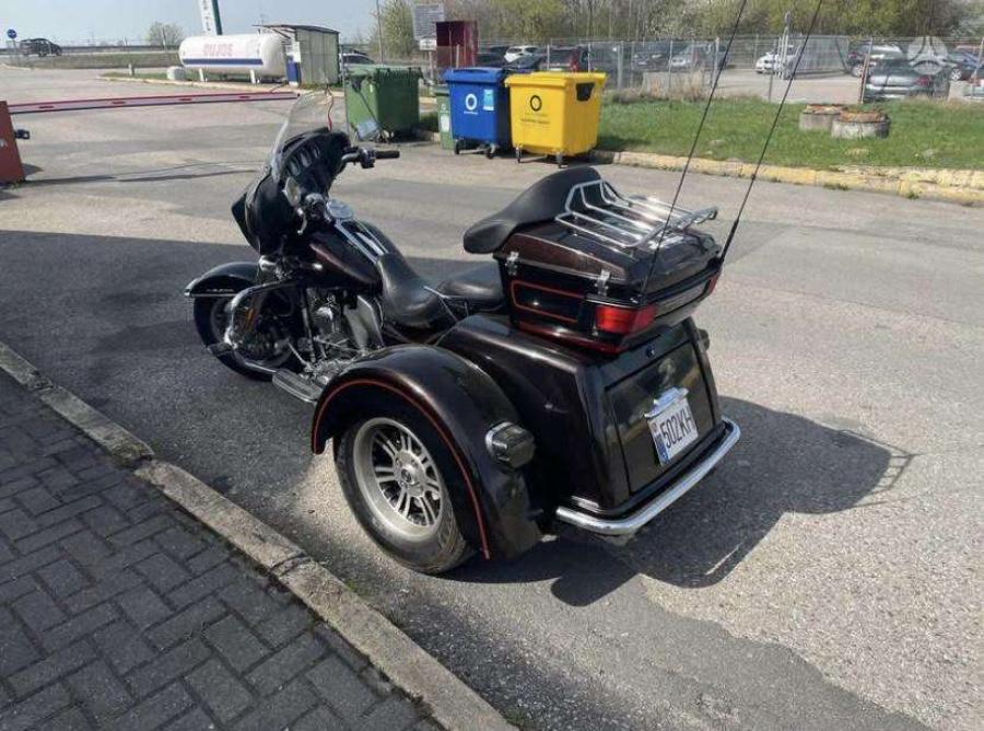 Red Harley-Davidson Tri Glide Ultra 2014 in Kaunas, with an engine capacity of 1.60 L and mileage of 48 thousand km for 13900 €, photo 7 on AUTOMOTO.COM.LV