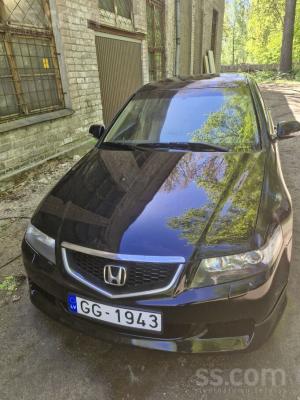 Melns Honda Accord 2003 Liepāja, ar dzinēja tilpumu 2.40 L un nobraukumu 312 tūkst. km par 600 €, foto  vietnē AUTOMOTO.COM.LV