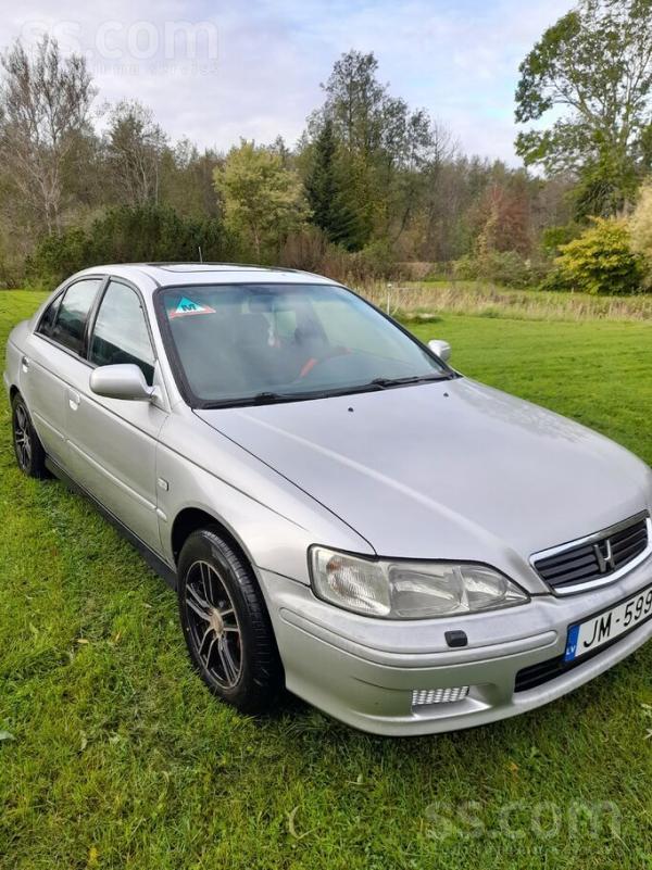 Honda Accord 1998 in Tukums on AUTOMOTO.COM.LV Grey Honda Accord 1998 in Tukums, with an engine capacity of 1.80 L and mileage of 318 thousand km for 1350 €, photo 7 on AUTOMOTO.COM.LV