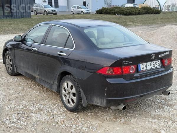 Violet Honda Accord 2006 in Riga, with an engine capacity of 2.40 L and mileage of 325 thousand km for 599 €, photo 2 on AUTOMOTO.COM.LV