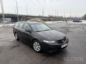 Violets Honda Accord 2006 Rīga, ar dzinēja tilpumu 2.00 L un nobraukumu 185 tūkst. km par 1700 €, foto  vietnē AUTOMOTO.COM.LV