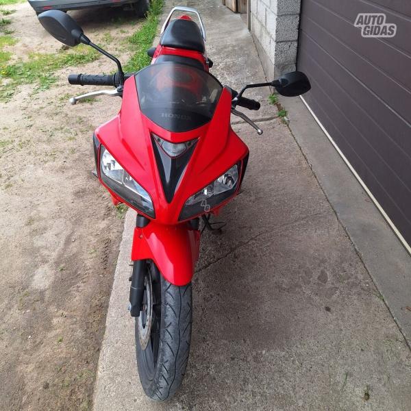 Sarkans Honda CB 125R 2007 Raseiniai, ar dzinēja tilpumu 0.13 L un nobraukumu 25 tūkst. km par 1500 €, foto 2 vietnē AUTOMOTO.COM.LV