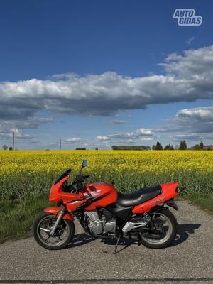 Red Honda CB 500F 2000 in Sirvintos, with an engine capacity of 0.50 L and mileage of 24 thousand km for 1700 €, photo  on AUTOMOTO.COM.LV