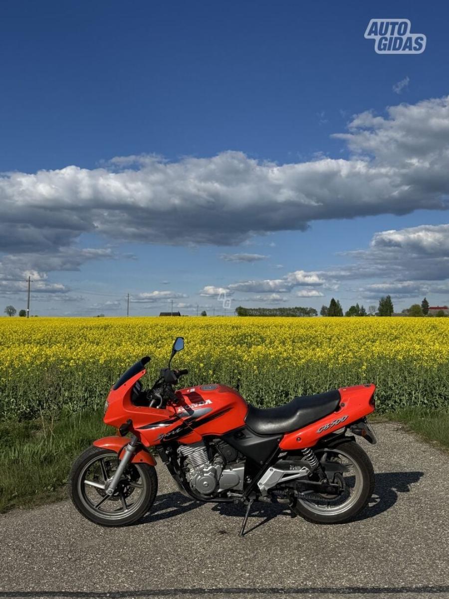 Red Honda CB 500F 2000 in Sirvintos, with an engine capacity of 0.50 L and mileage of 24 thousand km for 1700 €, photo 1 on AUTOMOTO.COM.LV