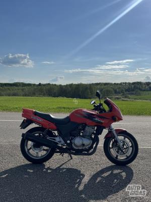 Red Honda CB 500F 2000 in Sirvintos, with an engine capacity of 0.50 L and mileage of 24 thousand km for 1700 €, photo 3 on AUTOMOTO.COM.LV